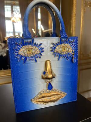 The Face of Schiaparelli - Iconic Handbags and Much More - PurseBop